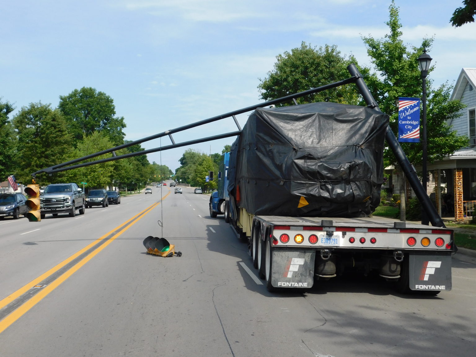 Semi hooks traffic signal, pole; U.S. 40 traffic flow disrupted in ...